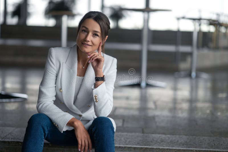 Smiling Relaxed Pretty Woman Sitting on the Steps Stock Photo - Image ...