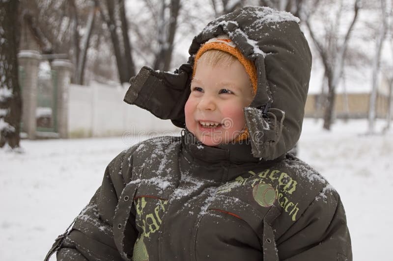 Smiling Ruddy-faced Little Boy Stock Photo - Image of infant, hood: 4693634