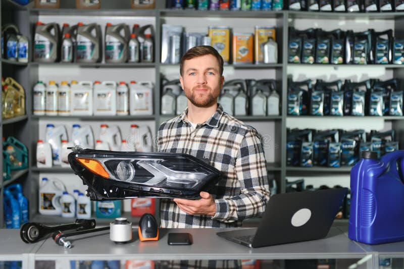 Smiling Salesman Auto Parts Store Stock Image - Image of shopper, seller: 308952905