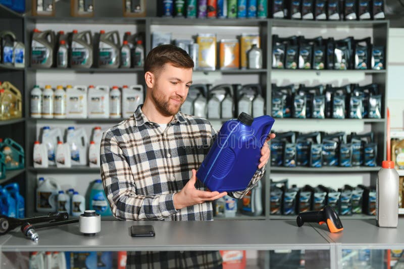 Smiling Salesman Auto Parts Store Stock Photo - Image of auto ...