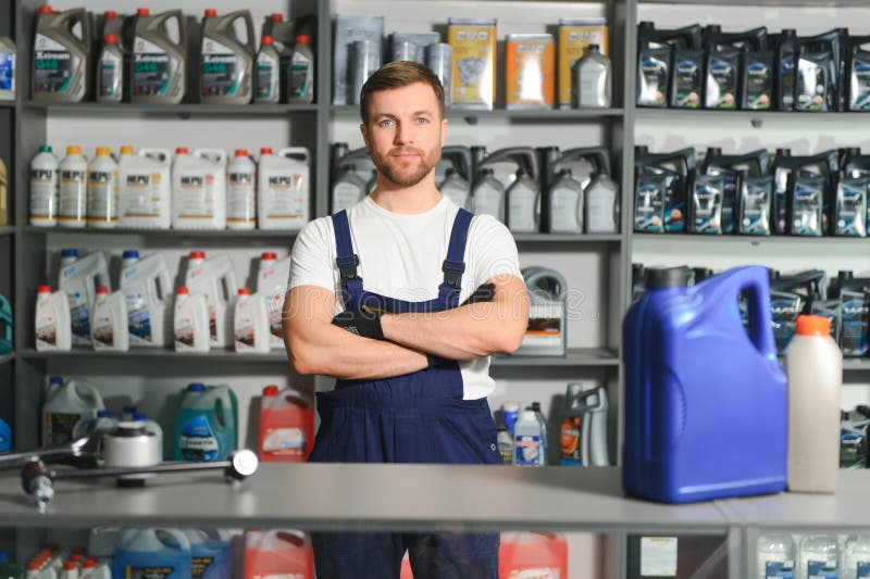 Smiling Salesman Auto Parts Store Stock Photo - Image of business ...