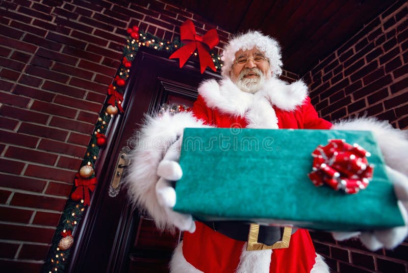 Santa Giving Present for Christmas Stock Image - Image of glasses ...