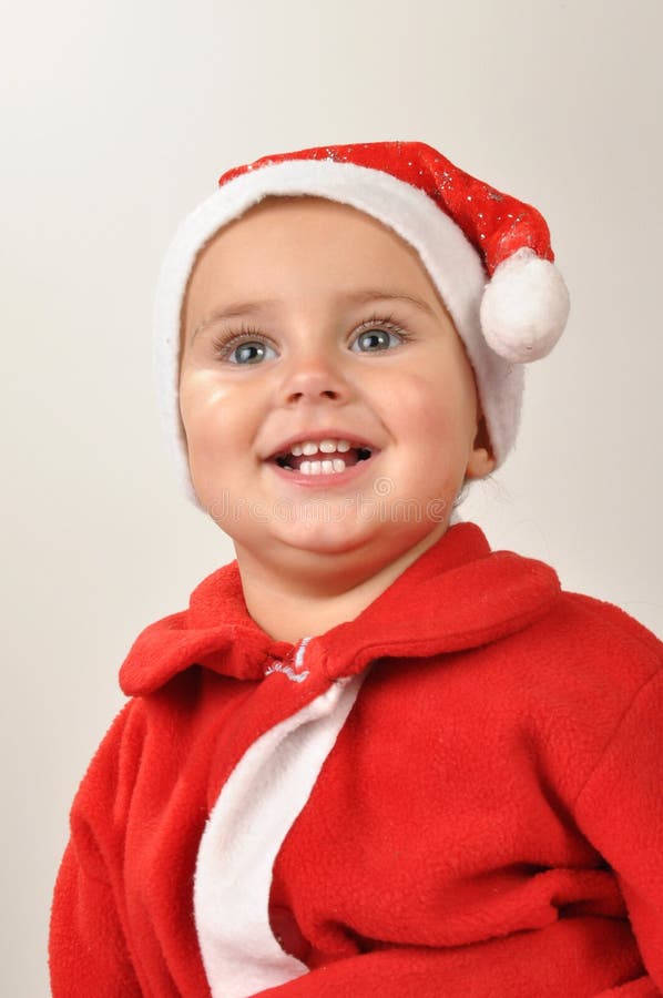 Smiling Santa toddler girl stock photo. Image of clothing - 22382866