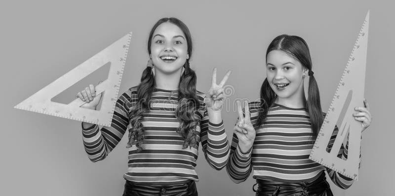 Smiling School Children Hold Math Tool of Triangle Stock Image - Image ...