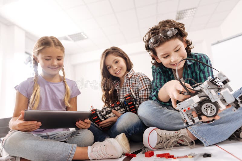 Smiling School Children Using Devices in the Science Studio Stock Image ...