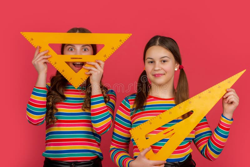 Smiling School Girls Hold Math Tool of Triangle Stock Photo - Image of ...
