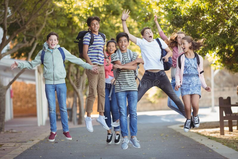 Smiling School Kids Having Fun on Road in Campus Stock Image - Image of ...