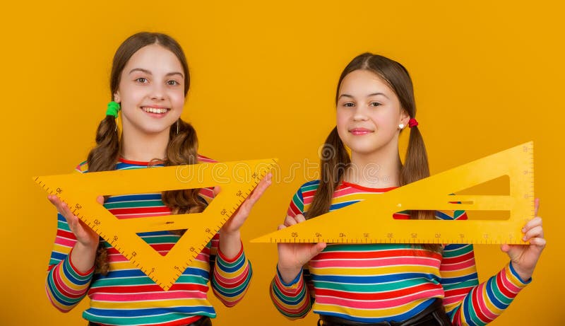 Smiling School Kids Hold Math Tool of Triangle Stock Photo - Image of ...