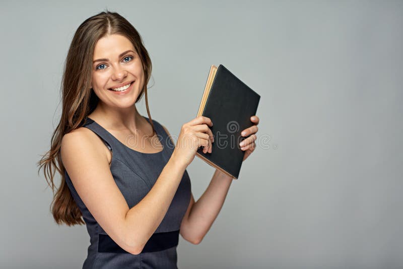Smiling School Teacher Holding Book Stock Photo - Image of happy, bank ...