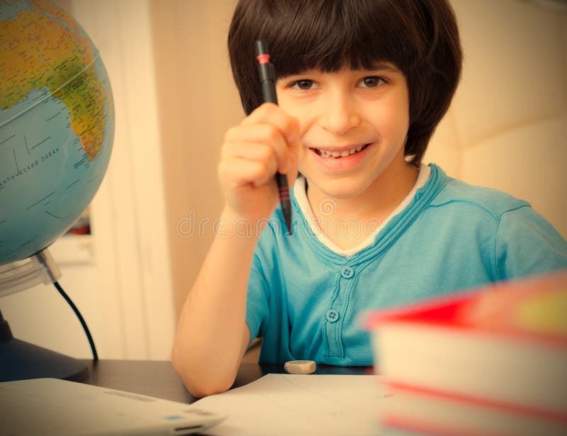 Smiling Schoolboy Doing Homework Stock Image - Image of book, child ...