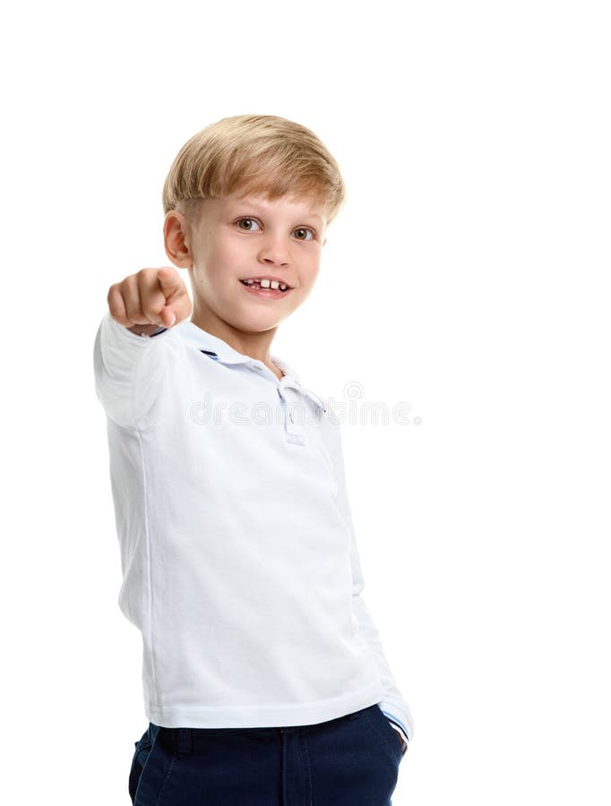 Smiling schoolboy pointing stock image. Image of cheerful - 96441097