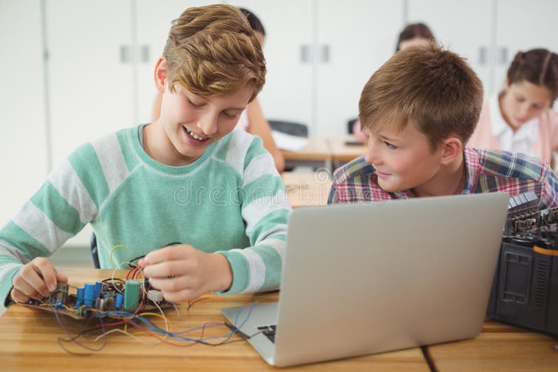 Smiling Schoolboys Working on Electronical Project in Classroom Stock ...