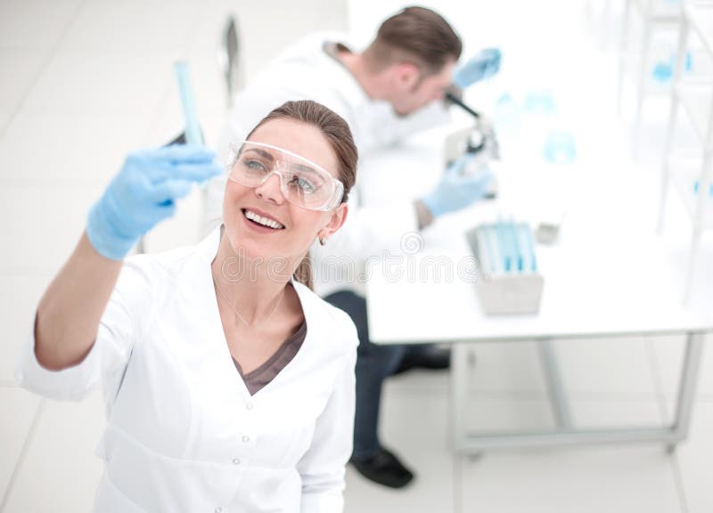 Smiling Scientist Looking at the Test Results Stock Image - Image of ...