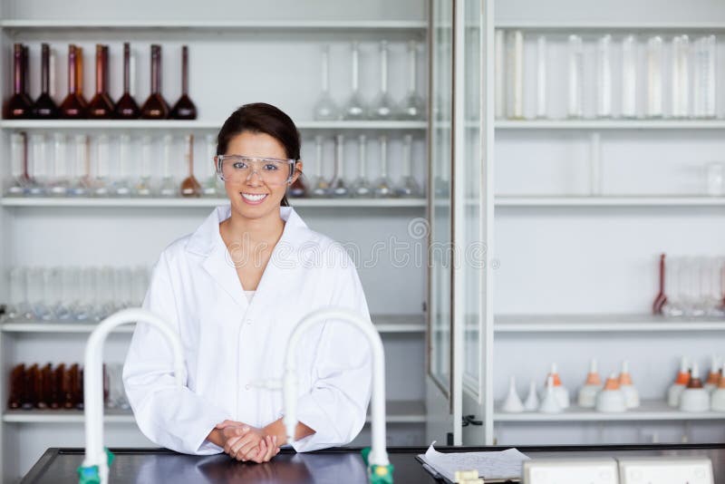 Smiling scientist posing stock photo. Image of person - 21146976