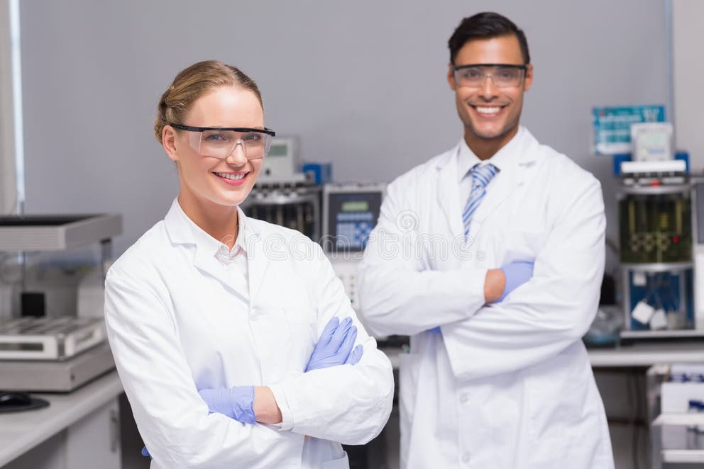 Smiling Scientists Looking at Camera Arms Crossed Stock Image - Image ...