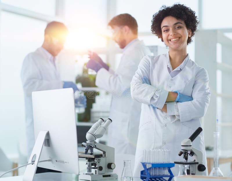 Smiling Scientists Looking at Camera Arms Crossed in Laboratory Stock ...