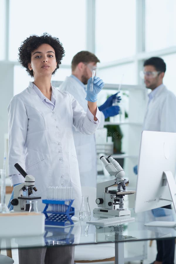 Smiling Scientists Looking at Camera Arms Crossed in Laboratory Stock ...