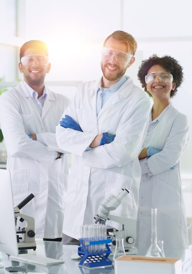 Smiling Scientists Looking at Camera Arms Crossed in Laboratory Stock ...