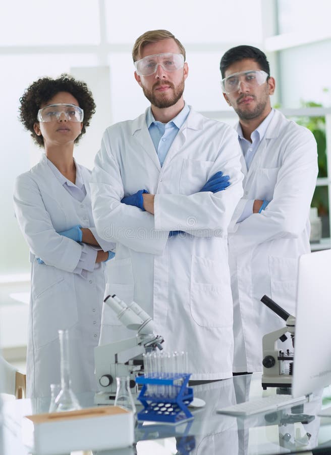 Smiling Scientists Looking at Camera Arms Crossed in Laboratory Stock ...