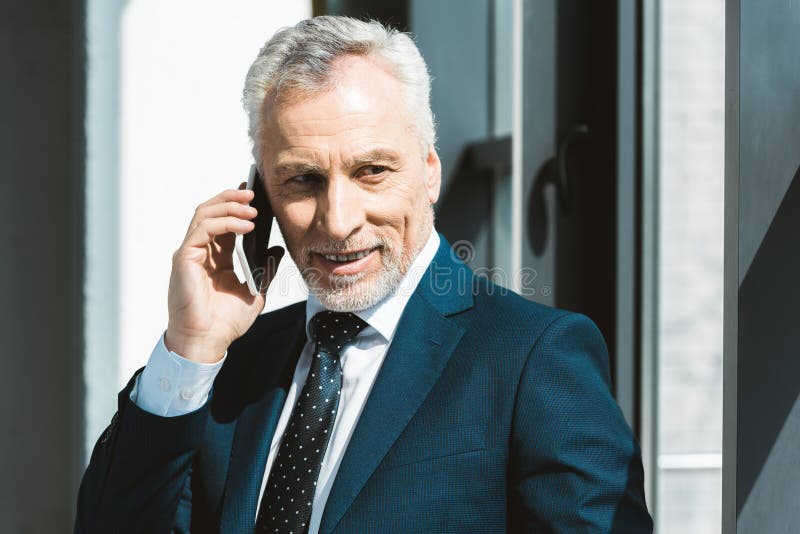Smiling Senior Businessman Talking by Smartphone Stock Image - Image of ...