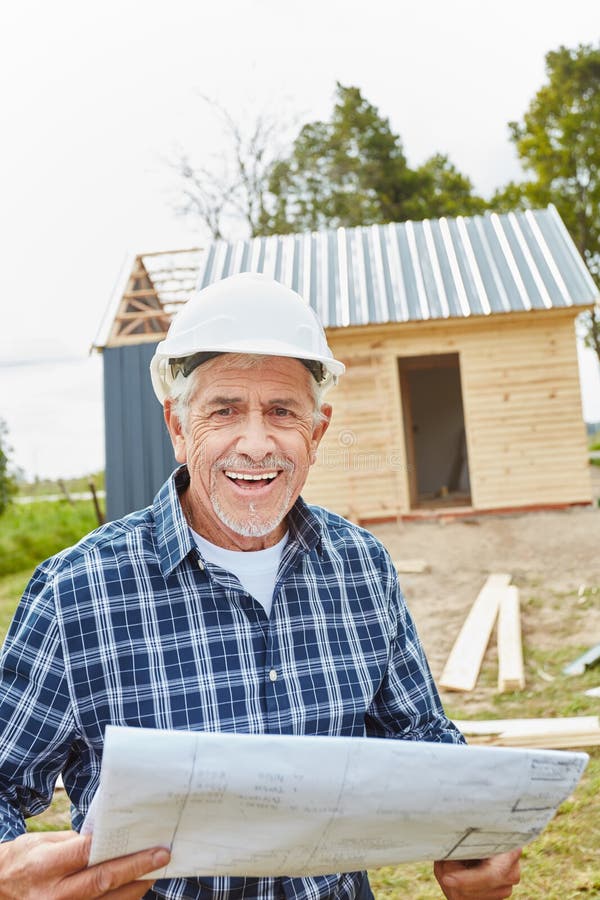 Smiling Senior Citizen at Construction Site Stock Image - Image of ...