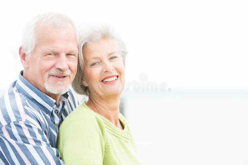 Smiling senior couple stock image. Image of adults, green - 32021347