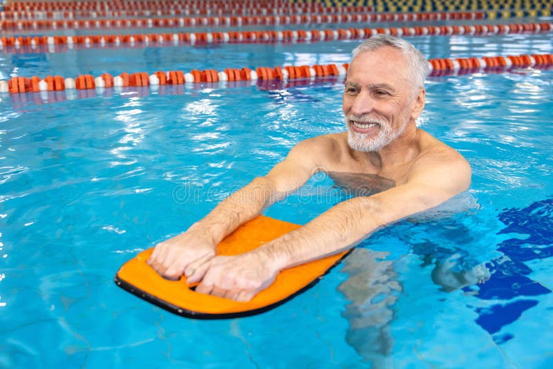 Smiling Senior Gray-haired Man Swimming Stock Image - Image of healthy ...