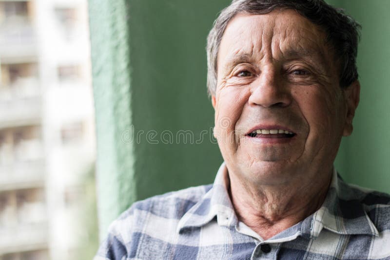 Smiling senior man stock image. Image of candid, mature - 80756231
