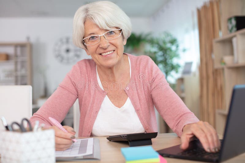 Smiling Senior Woman Accounting at Home Stock Image - Image of expenses ...