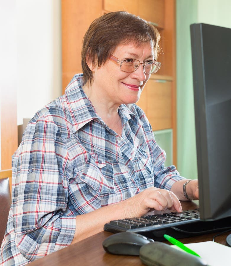 Woman Using Library Computer Stock Image - Image of internet, older ...