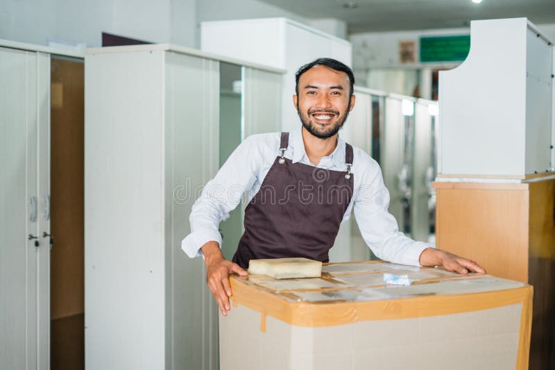 Smiling Shop Assistant Man after Packing Furniture Using Cardboard ...