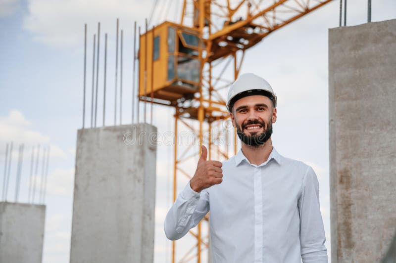 Smiling and Showing Thumb Up. Man in Uniform is Working on the ...