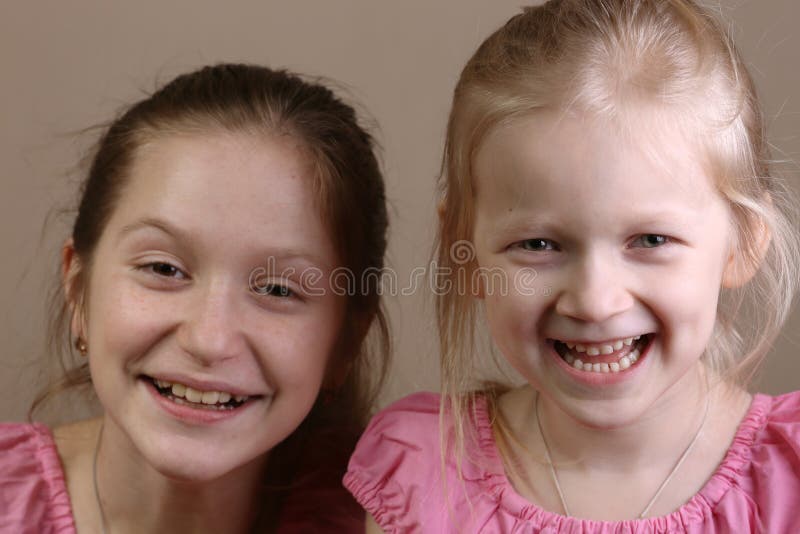Smiling sisters stock image. Image of female, child, summer - 41881811