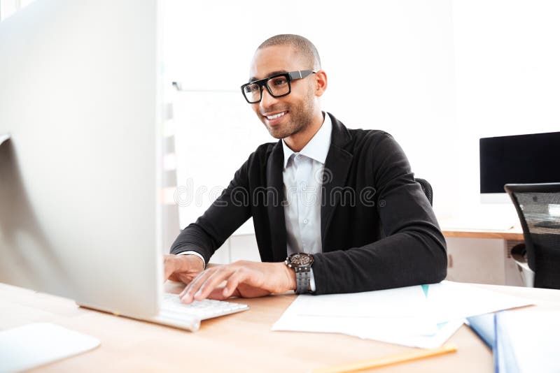 Smiling Smart Businessman Working with Computer in Office Stock Image ...