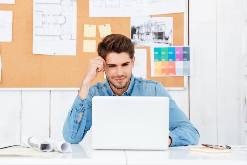 Smiling Smart Businessman Working with Computer at the Office Stock ...