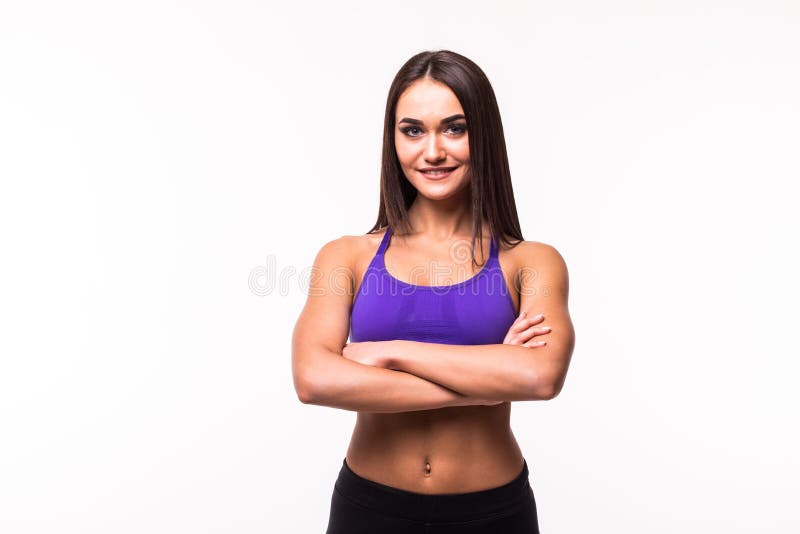 Smiling Sports Woman Standing with Arms Folded and Looking at Camera ... Smiling Sports Woman Standing with Arms Folded and Looking at Camera ...
