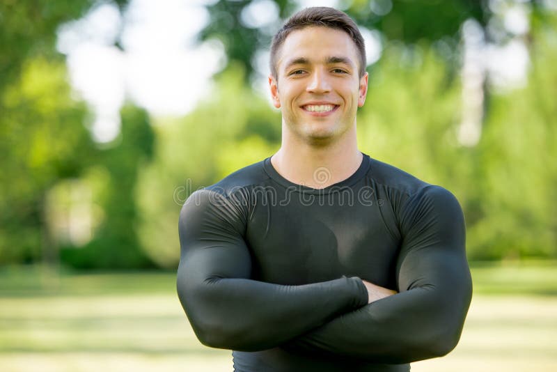 Smiling Sportsman Standing in the Park Stock Image - Image of park ...