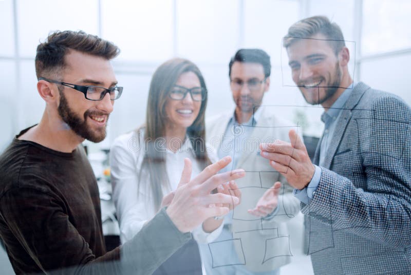 Smiling Staff Discussing Something Standing in the Office. Stock Image ...