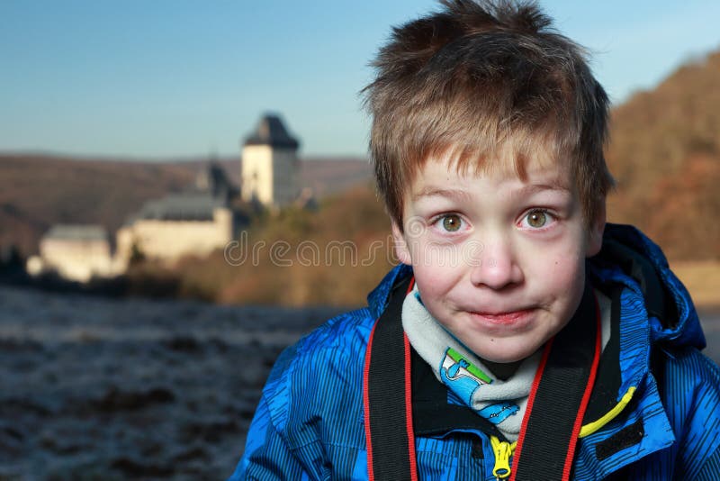 Smiling and Staring Boy with the Camera Belt by the Castle Stock Image ...