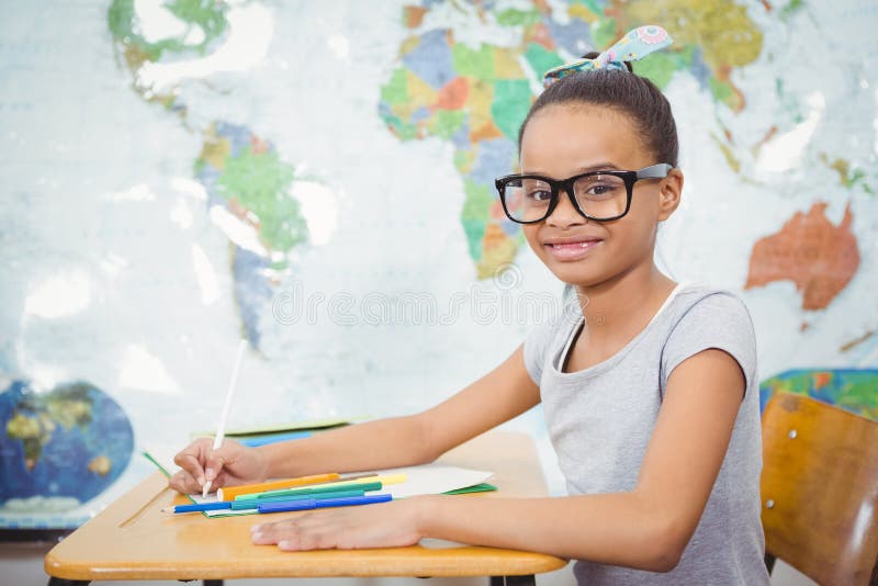 Smiling Student Doing Class Work Stock Image - Image of mixedrace ...