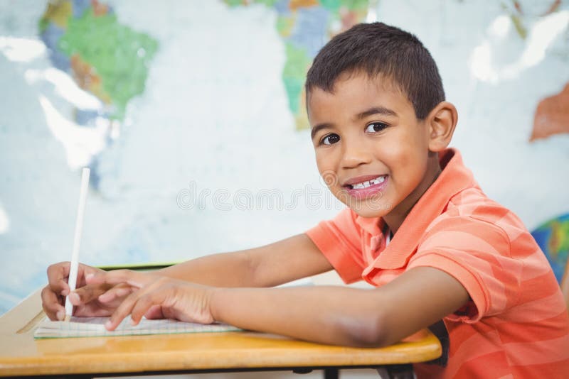 Smiling Student Doing Class Work Stock Image - Image of indoors, class ...