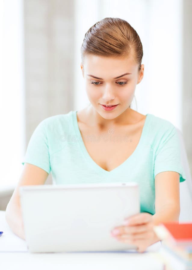 Closeup of Student Using Digital Tablet in Library Stock Photo - Image ...