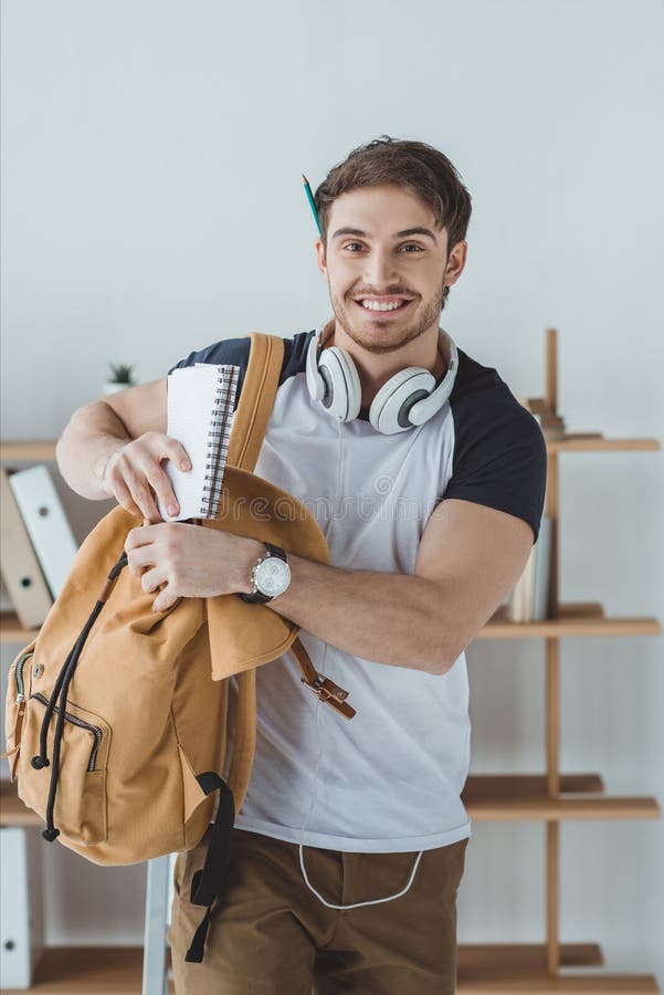 Smiling Student with Headphones Backpack Stock Photo - Image of ...