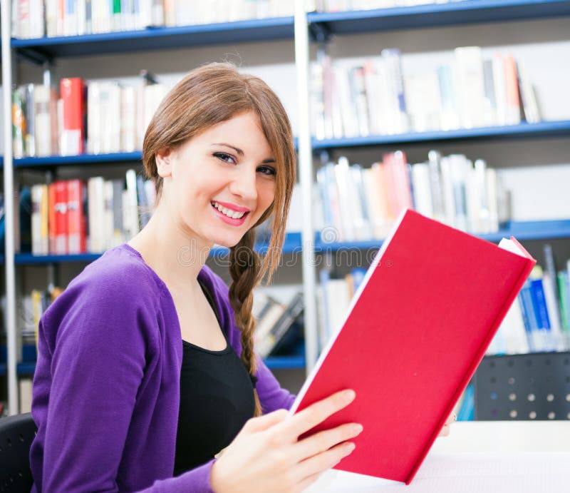 Smiling Student in a Library Stock Photo - Image of education, college ...