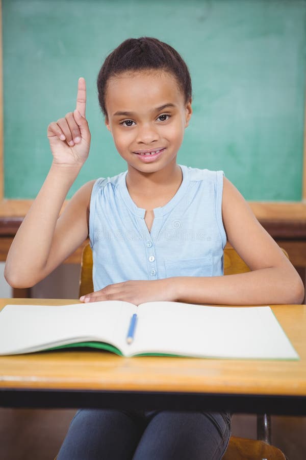 Smiling Student with a Rasied Hand Stock Image - Image of portrait ...