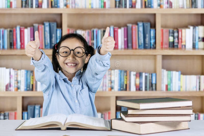 Smiling Student Shows Ok Gesture in Library Stock Image - Image of ...