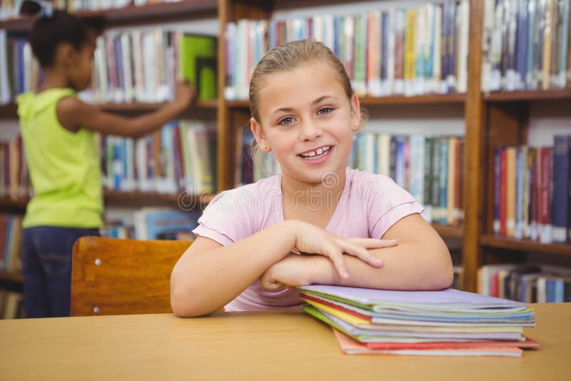 Smiling Student Sitting at a Table Stock Image - Image of development ...