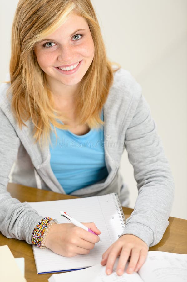 Smiling Student Teenager Sitting Behind Desk Write Stock Image - Image ...