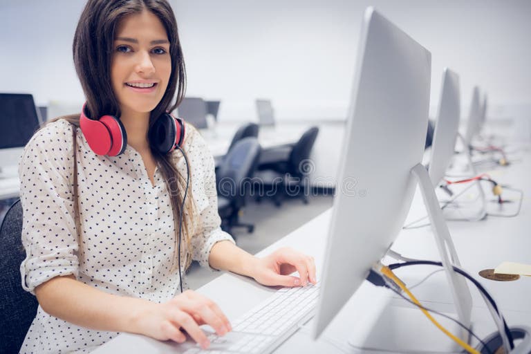 Smiling Student Working on Computer Stock Image - Image of computer ...