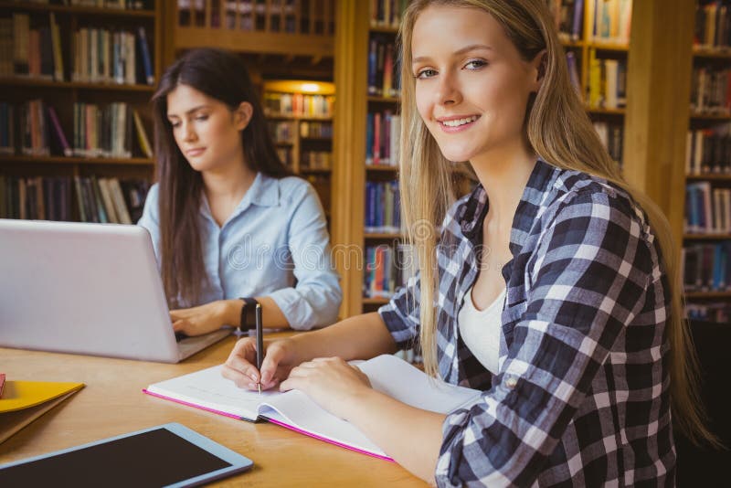Smiling Student Working in Library Stock Photo - Image of academic ...